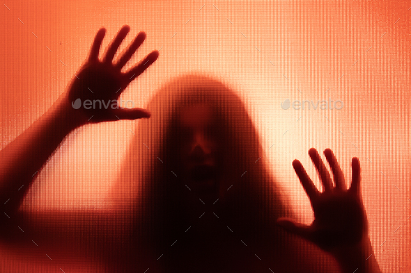 Shadowy figure behind glass - horror background Stock Photo by erika8213