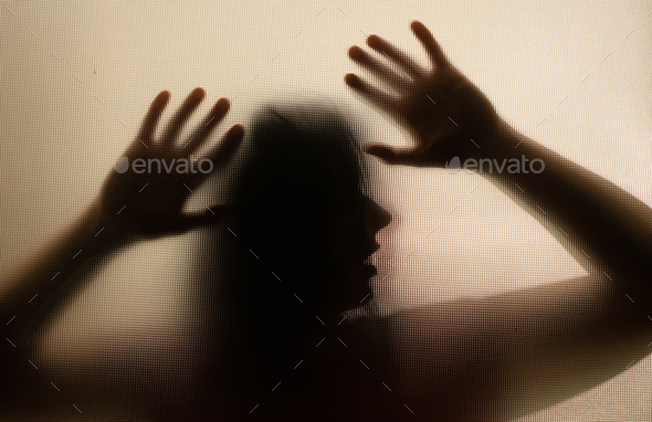 Shadowy figure behind glass - horror background Stock Photo by erika8213