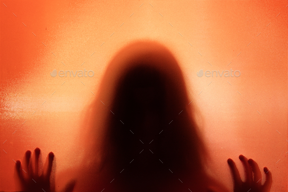 Shadowy figure behind glass - horror background Stock Photo by erika8213