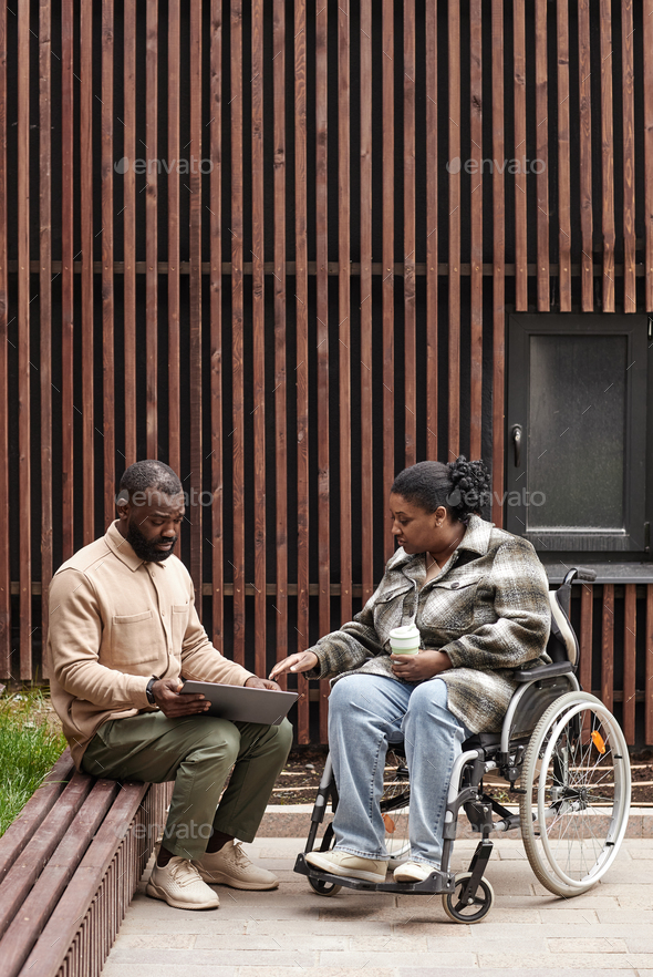 Black Woman with Disability in Outdoor Setting Stock Photo by ...