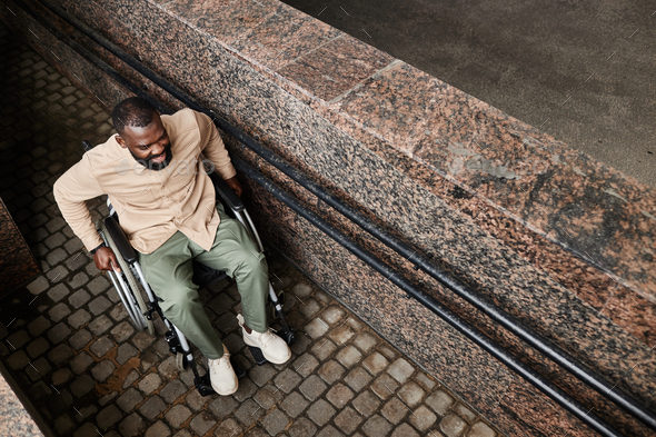 Man in Wheelchair using Ramp Stock Photo by seventyfourimages | PhotoDune