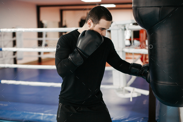 Boxers train in the ring and in the gym Stock Photo by yavorandriy