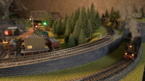 Steam locomotives running on model railroad. Stock Photo by stockfilmstudio