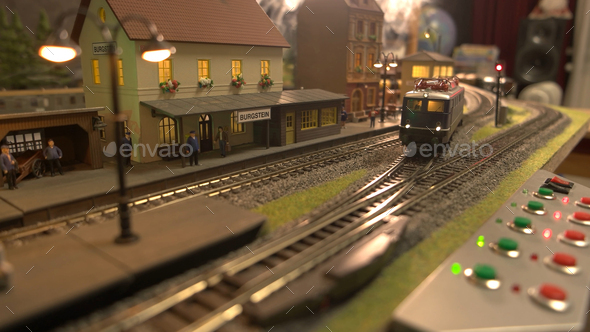 Model train with wagons is driving on model railroad. Stock Photo by ...