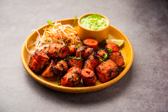 Tandoori Soya Chaap or soy chap dish prepared by marinating in tandoori ...