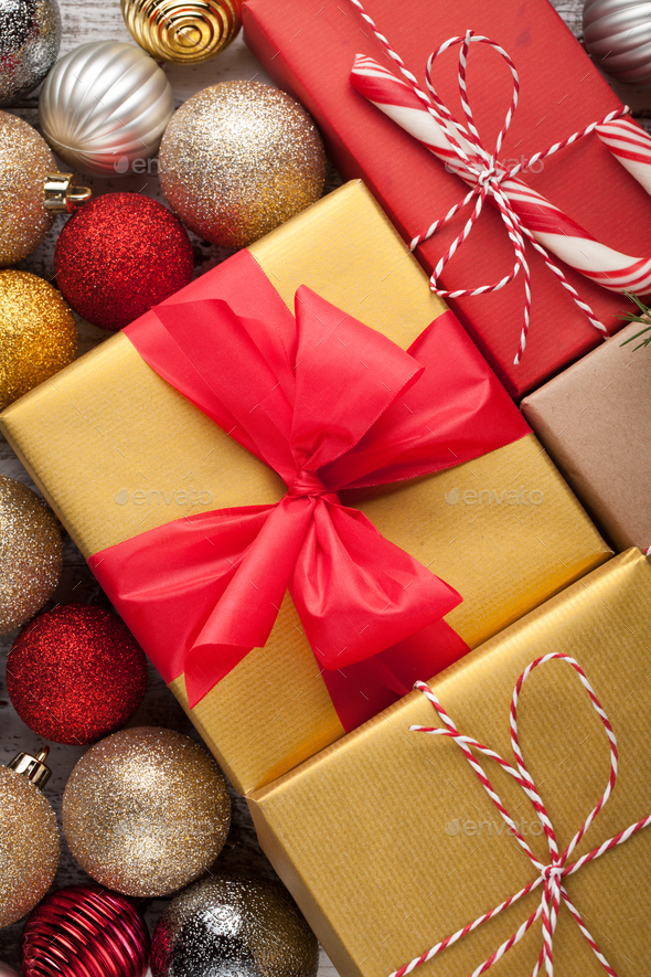 Colored boxes with gifts in a festive box with Christmas decorations ...