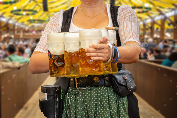 Oktoberfest, Munich. Waiter serve beer, close up. Octoberfest German ...