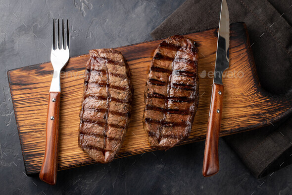 Closeup ready to eat steak Top Blade beef breeds of black Angus with ...
