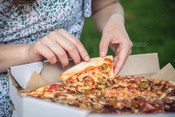 Close-up, a woman takes a quok bird from a box. Stock Photo by puhimec
