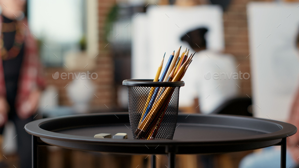 Colorful pencils and erasers on table used to draw artwork Stock Photo ...