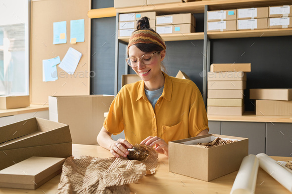 Worker packing order in box Stock Photo by Media_photos | PhotoDune