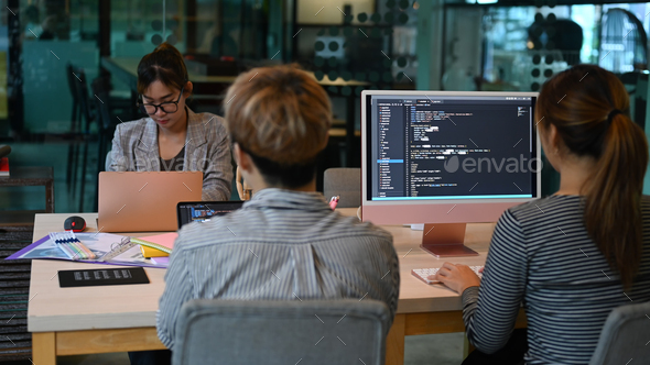 Programer team working in modern office Stock Photo by prathanchorruangsak