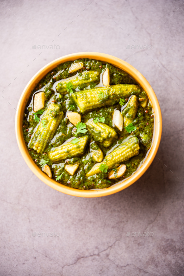 palak baby corn sabzi also known as spinach makai curry served with ...