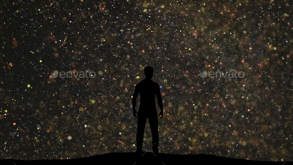 The man stands on a beautiful starry sky background. Stock Photo by artemp3