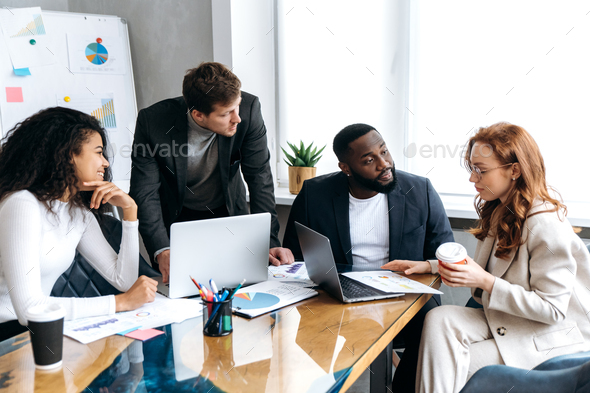 business people work women men briefing Stock Photo by thelivephotos