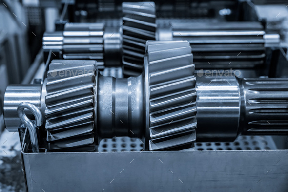 Brand new gear shafts for tractor transmission Stock Photo by Yakov_Oskanov