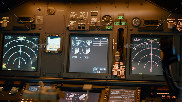 Airplane cockpit with flying command on control panel Stock Photo by DC ...