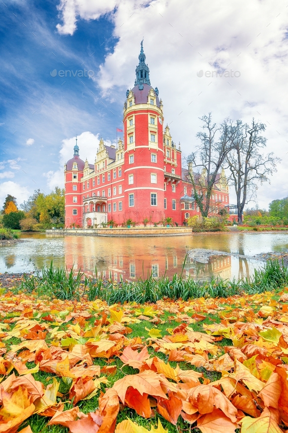 Breathtaking autumn landscape with Muskau castle. Stock Photo by Pilat666
