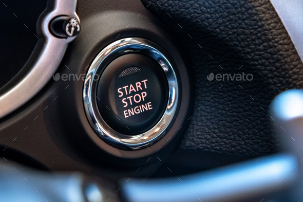 Engine start stop button in modern car close Stock Photo by Yakov_Oskanov