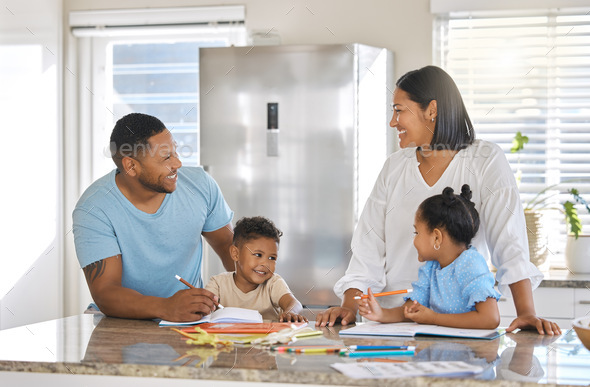 This is called teamwork. Shot of parents helping their children with ...
