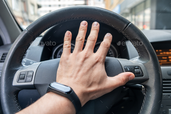 Drivers hand on a steering wheel of a car. Stock Photo by bilanol ...