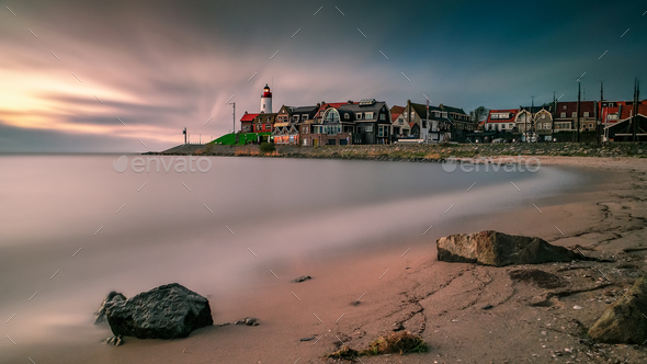 Urk Flevoland Netherlands sunset at the lighthouse and harbor of Urk ...