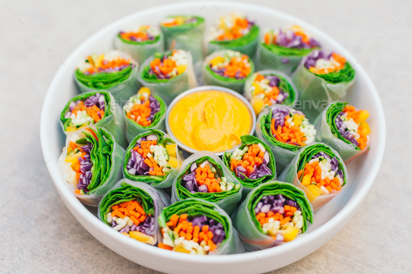 Tasty green spring rolls made of rice paper and spinach, filled with ...