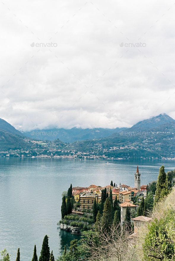 Red roofs of ancient houses on the shores of Lake Como. Varenna, Italy ...