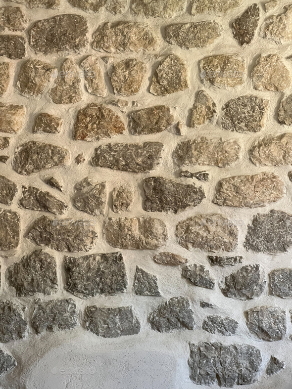 Ancient masonry wall of the building. Close-up Stock Photo by Nadtochii