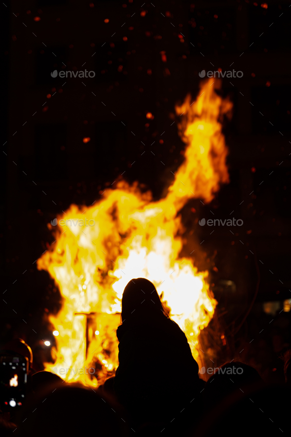 group of people enjoying a bonfire in a festive atmosphere. Stock Photo ...