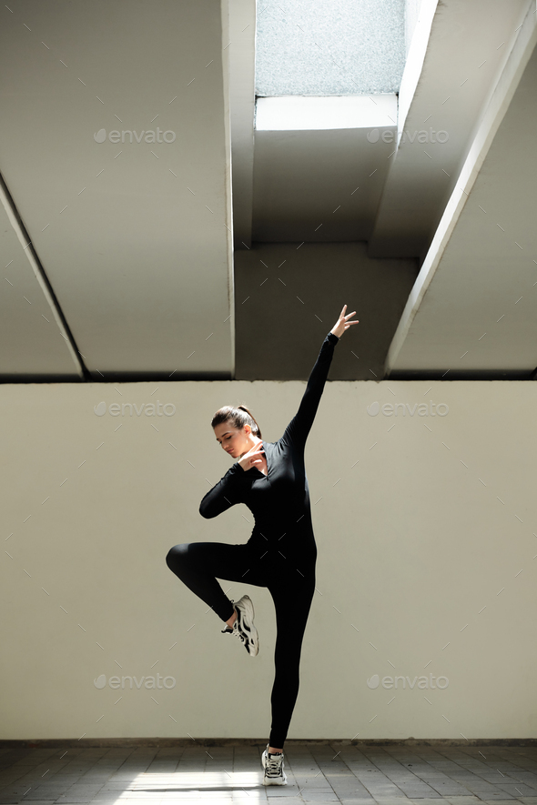 Female dancer standing in pose Stock Photo by DragonImages | PhotoDune