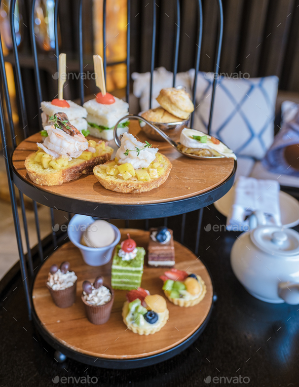 Luxury high tea with snack and tea in a luxury hotel Stock Photo by ...