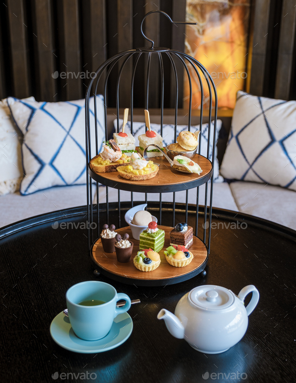 Luxury high tea with snack and tea in a luxury hotel Stock Photo by ...