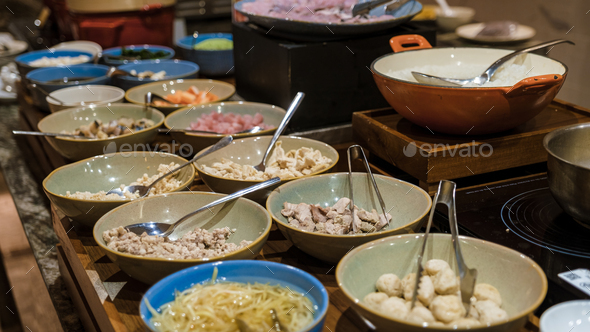 Breakfast buffet in a luxury hotel. Japanese corner with sushi and ...