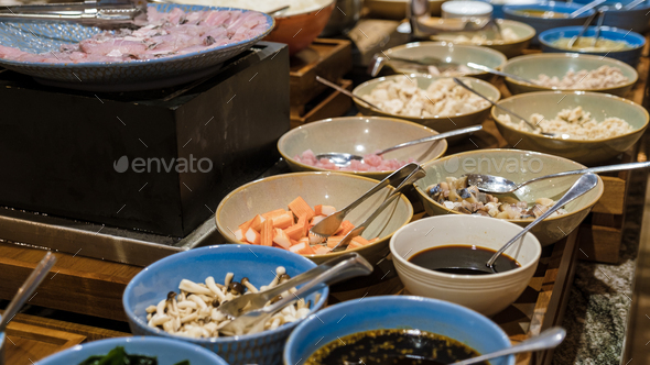 Breakfast buffet in a luxury hotel. Japanese corner with sushi and ...