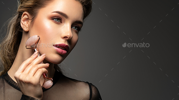 Beautiful face of young woman with perfect healthy skin. model caring ...