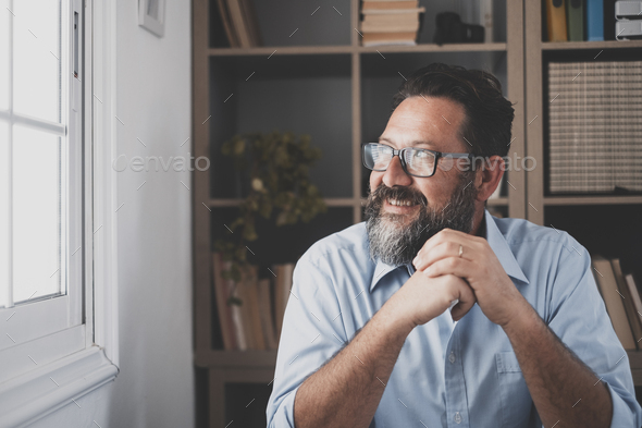 Confident man looking away with big smile. Happy handsome guy looking ...