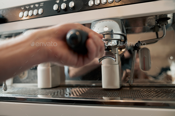 Photo of the process of installing portafilter in coffee machine Stock ...