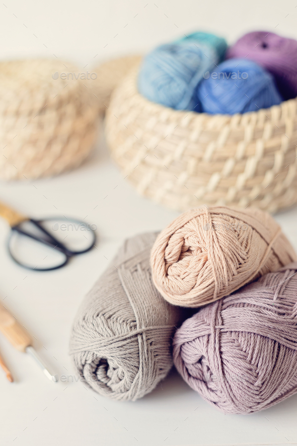 Craft hobby background with yarn in natural colors Stock Photo by OksaLy