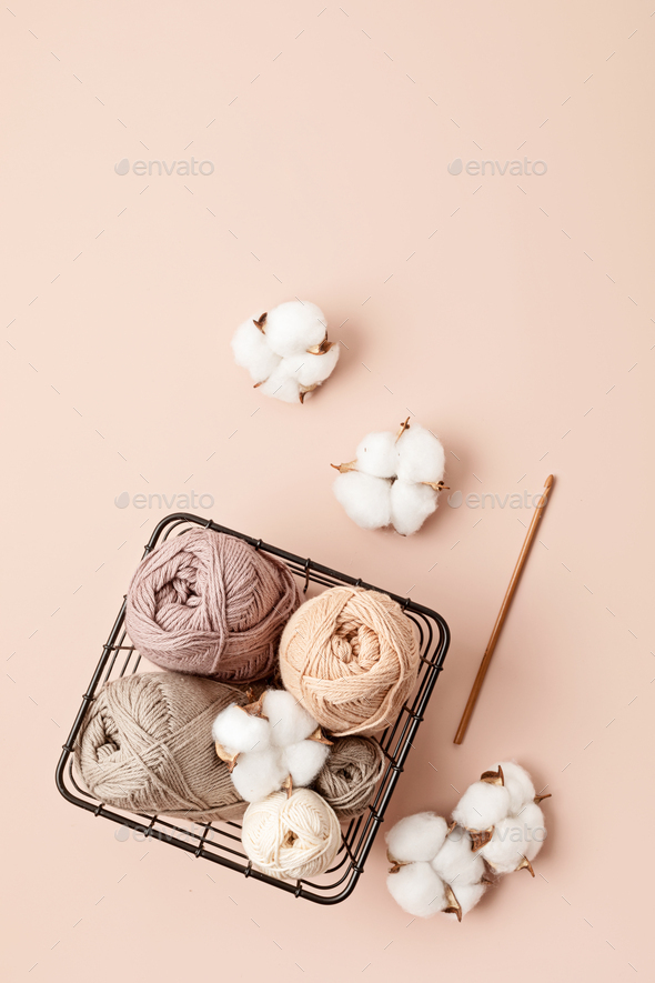 Craft hobby background with yarn in natural colors Stock Photo by OksaLy