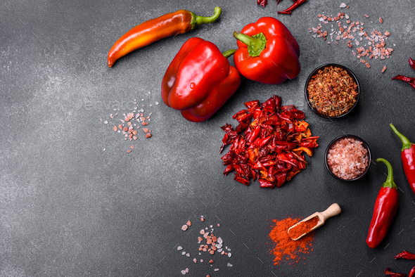 Pieces of dried paprika, preparation of powder spice for various dishes ...