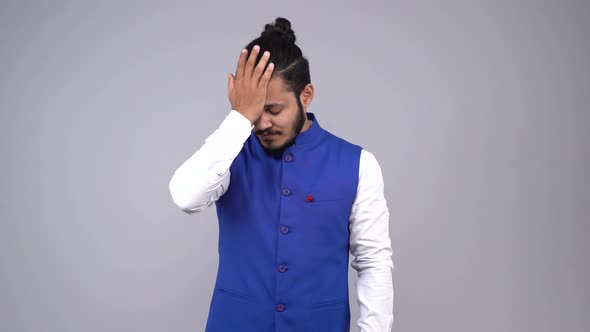 Disappointed Indian man in an Indian outfit, Stock Footage | VideoHive