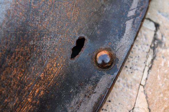 Old metal rivet, texture of old metal, marble. Venice, Italy. Stock ...