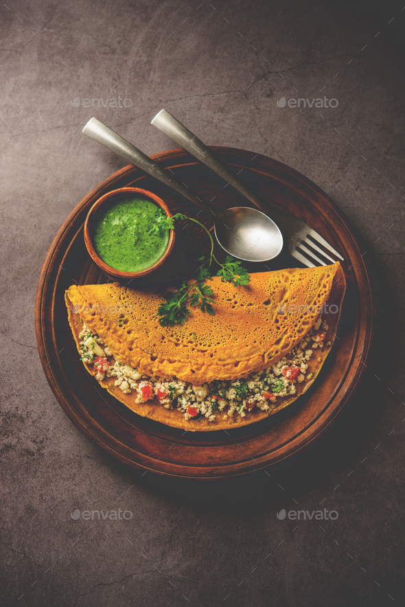 Paneer stuffed Besan chilla or Cheela made using chickpea flour with ...