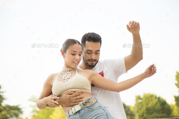 Couple dancing salsa in the street Stock Photo by sloomstudio | PhotoDune