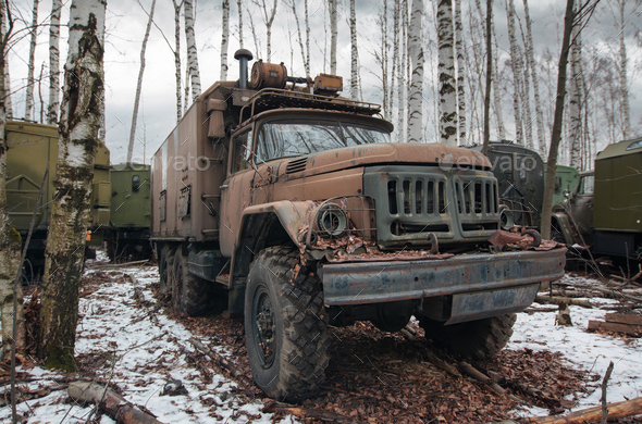 Broken abandoned military army truck in the forest with snow Stock ...