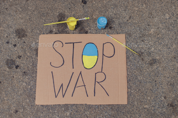 Focus on a poster Stop War with blue and yellow colors Stock Photo by ...