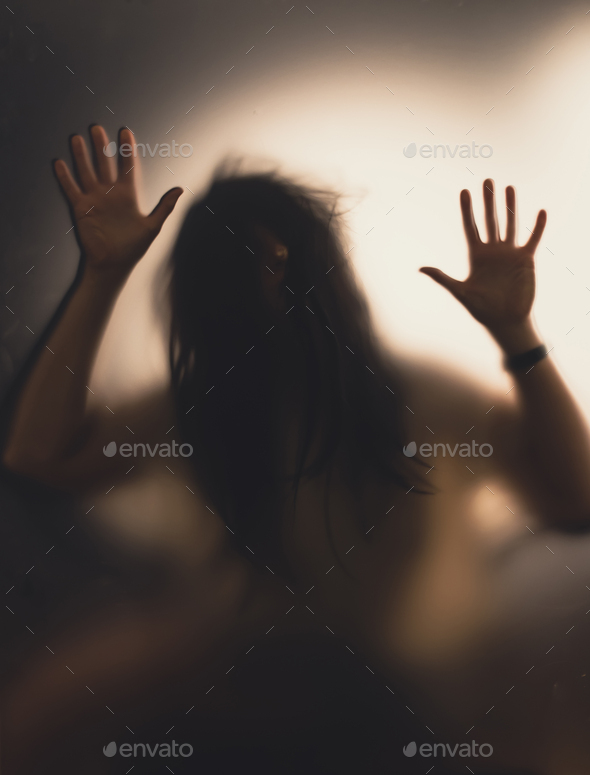 Shadowy figure behind glass - horror background Stock Photo by erika8213