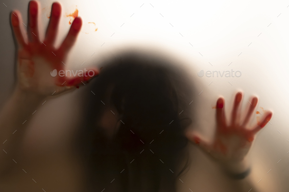Shadowy figure with blood behind glass - horror background Stock Photo ...