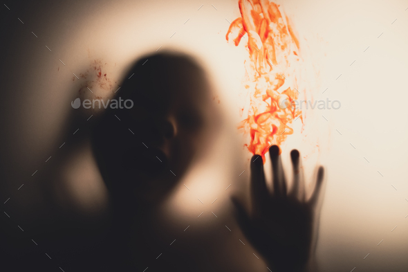 Shadowy figure, child behind glass with blood - horror background Stock ...
